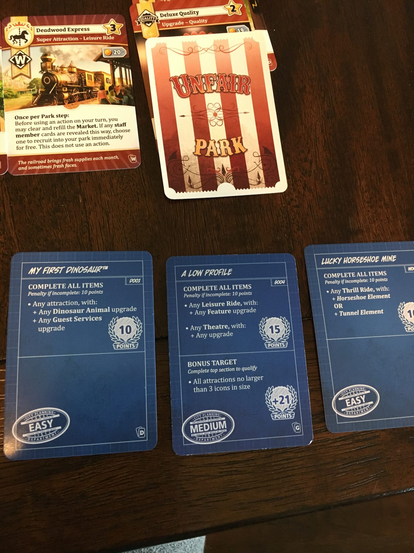 Unfair Game Review – Meeple Mountain